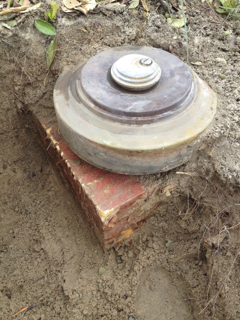 Anti-person mine, stacked on top of an anti-tank mine, stacked on top ...